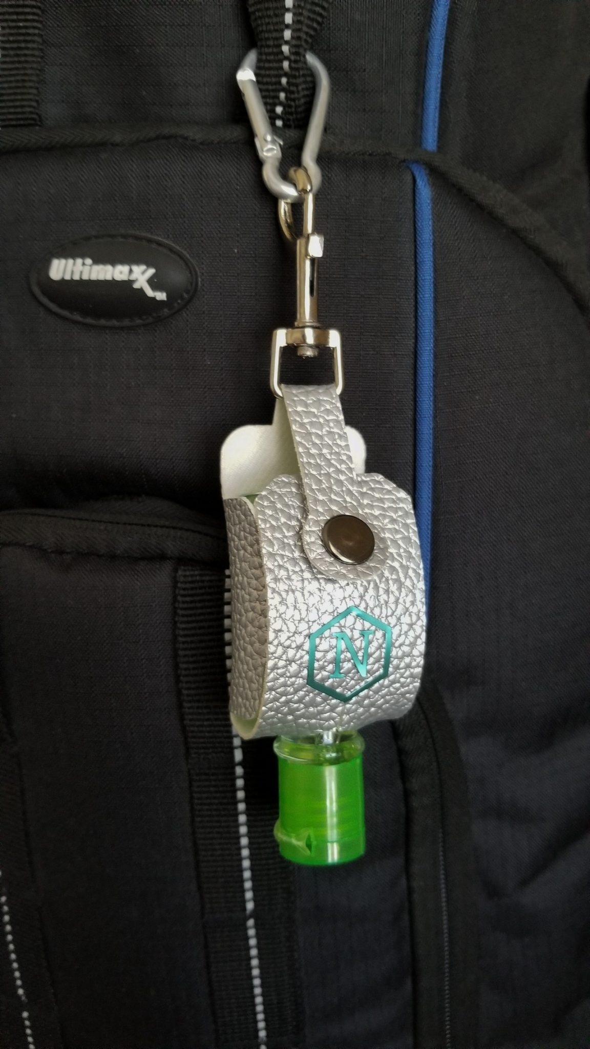 Travel Hand Sanitizer holder with Key Ring - The Nomad Studio